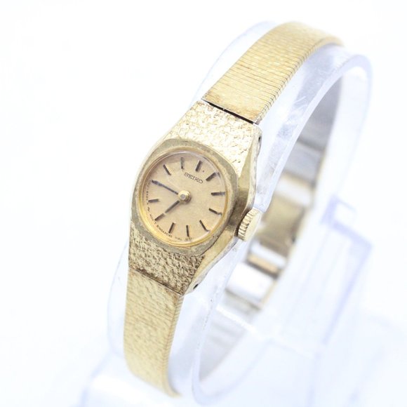Seiko | Accessories | Vintage Seiko Watch Womens Gold Tone Stainless Steel Singapore Movt 9s ...